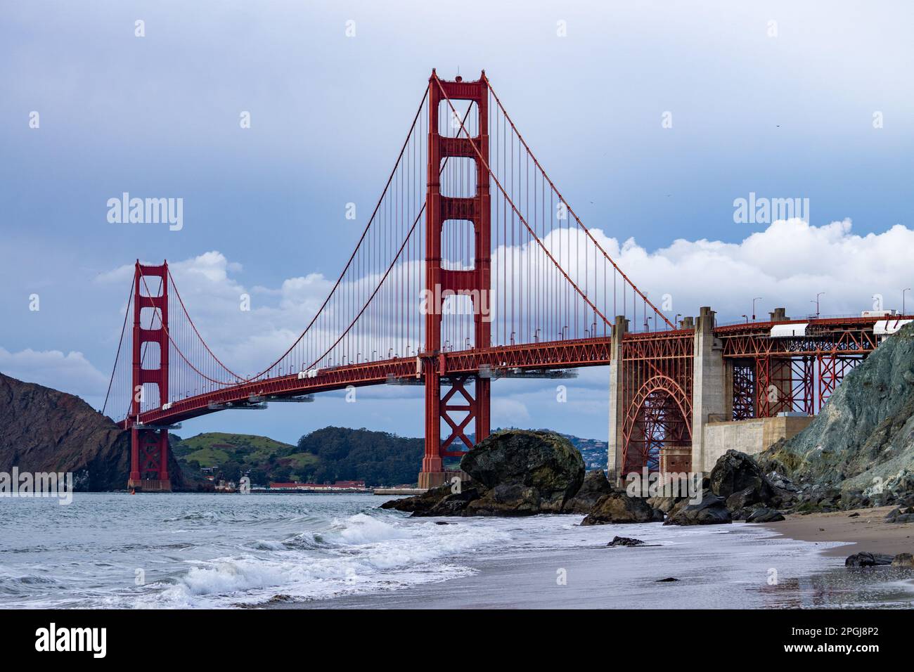 The iconic Golden Gate Bridge stands proudly over the glittering waters ...