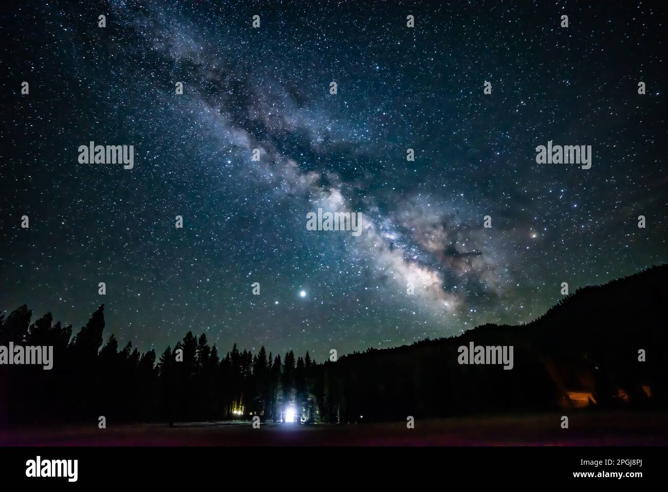 A captivating landscape of a night sky with a multitude of stars and a ...