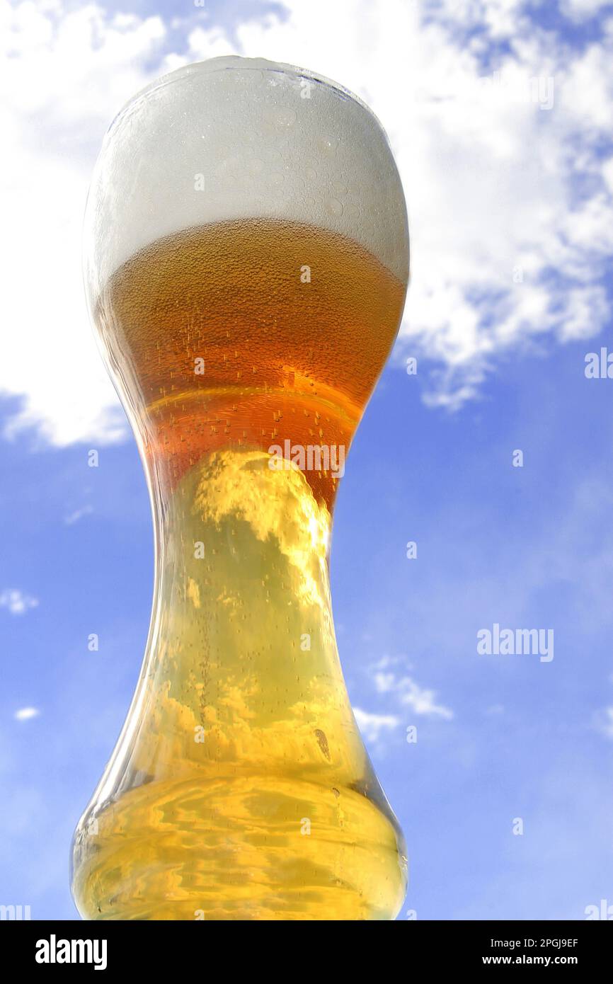 glass beer against blue sky Stock Photo - Alamy