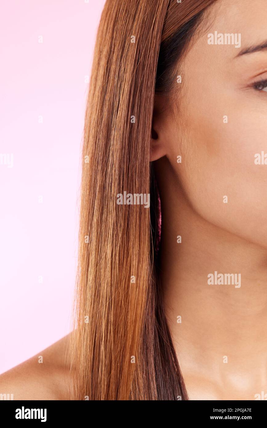 Zoom, hair and half face of black woman isolated in studio in pink ...