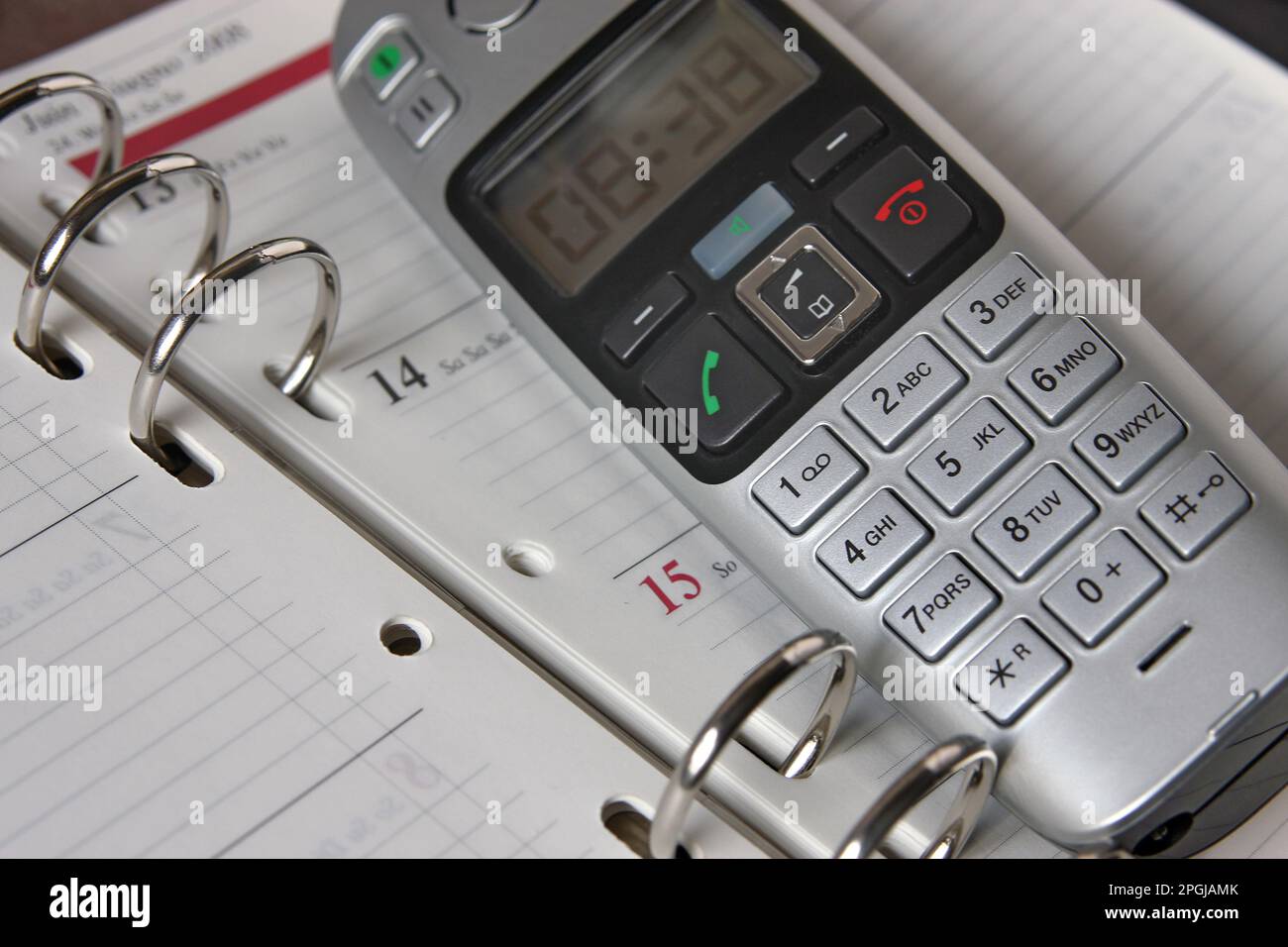 telephone receiver on diary Stock Photo - Alamy