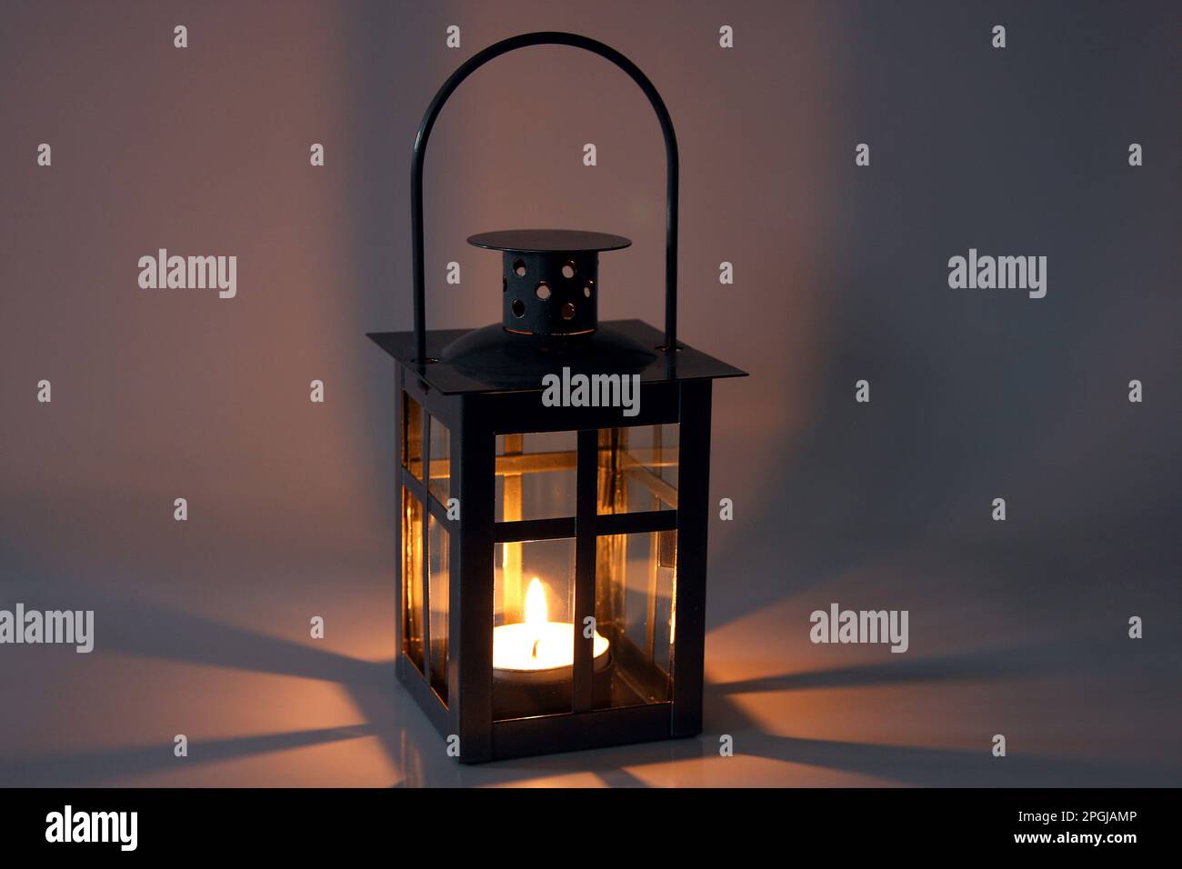 lantern with burning tea light Stock Photo - Alamy