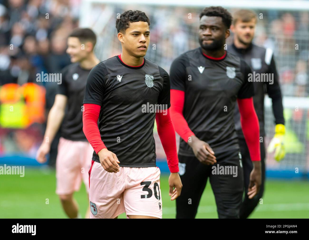 Grimsby’s Evan Khouri warms up before the Brighton and Hove Albion v ...