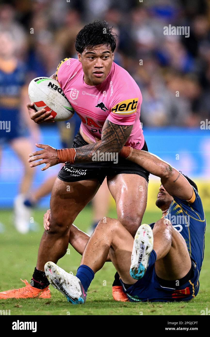 Brian To'o of the Panthers is tackled by Dylan Brown of the Eels during ...