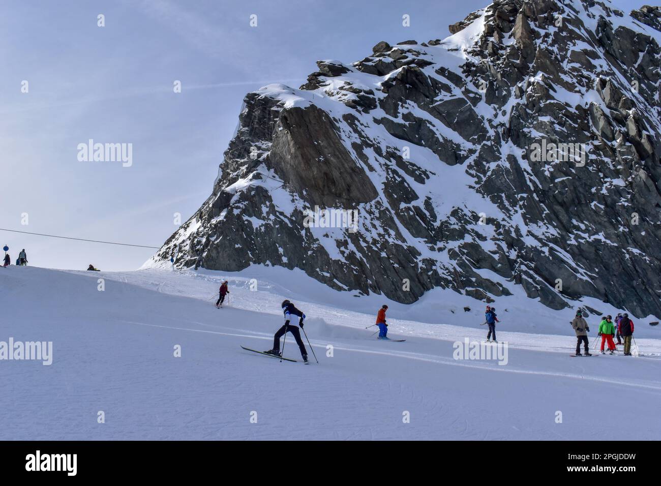 Skiing with amazing view of swiss famous mountains in beautiful winter ...