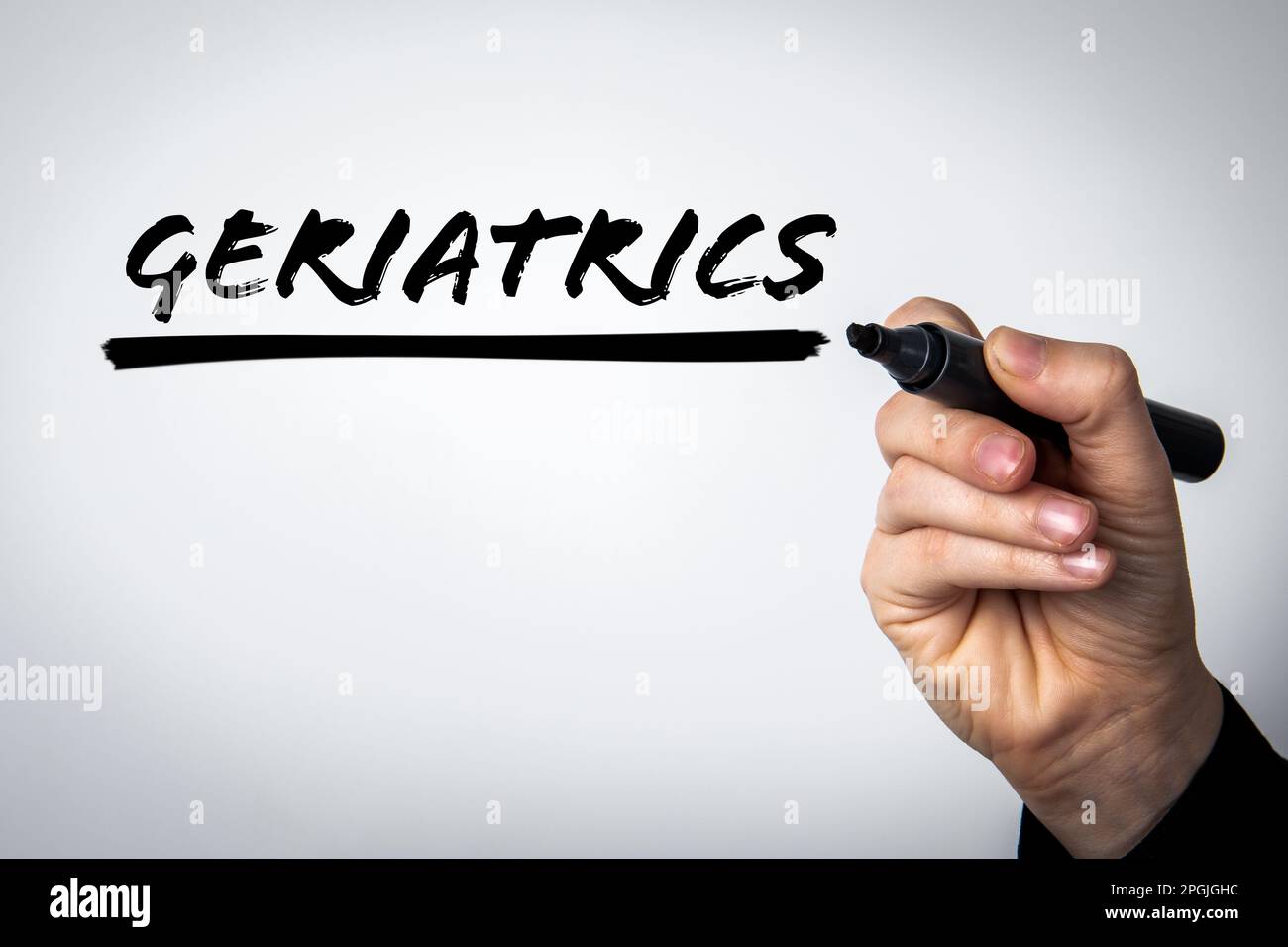 Geriatrics. Text written with a black marker on a white background ...