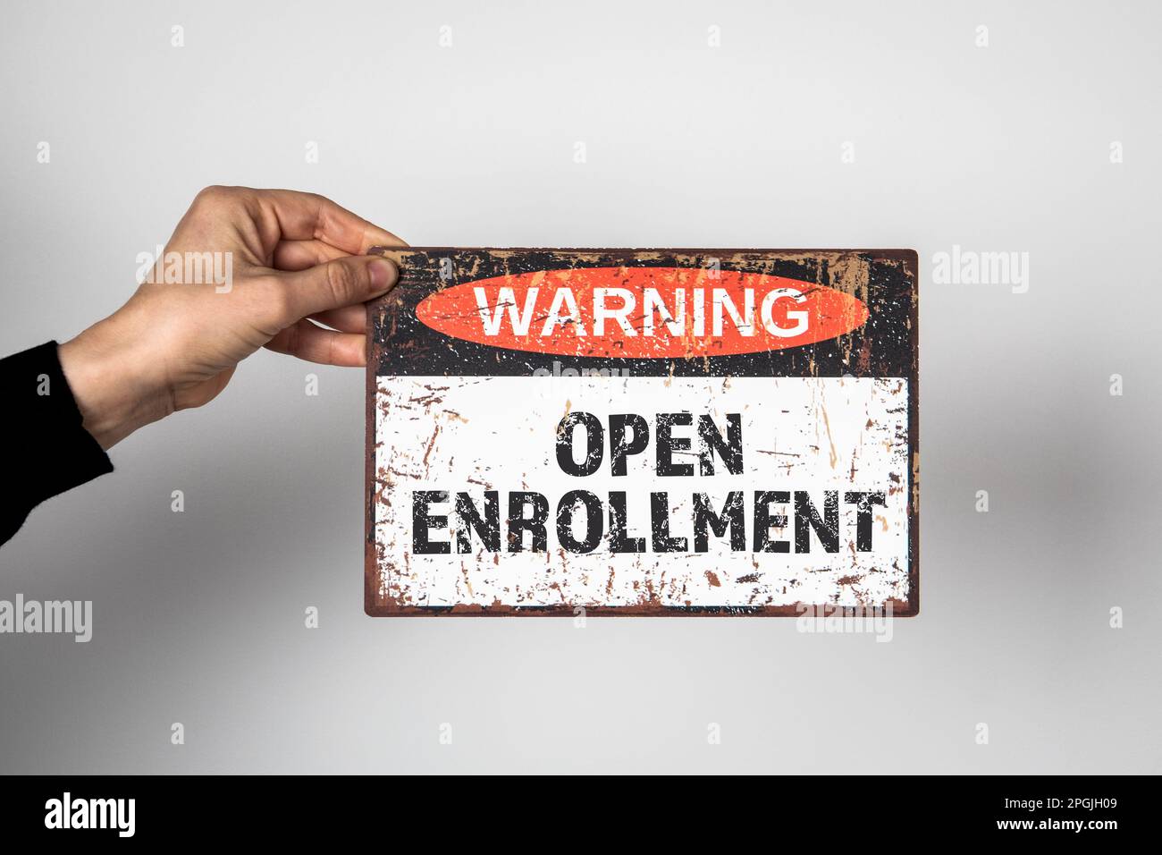 Open Enrollment. Warning sign with text on a white background in a ...