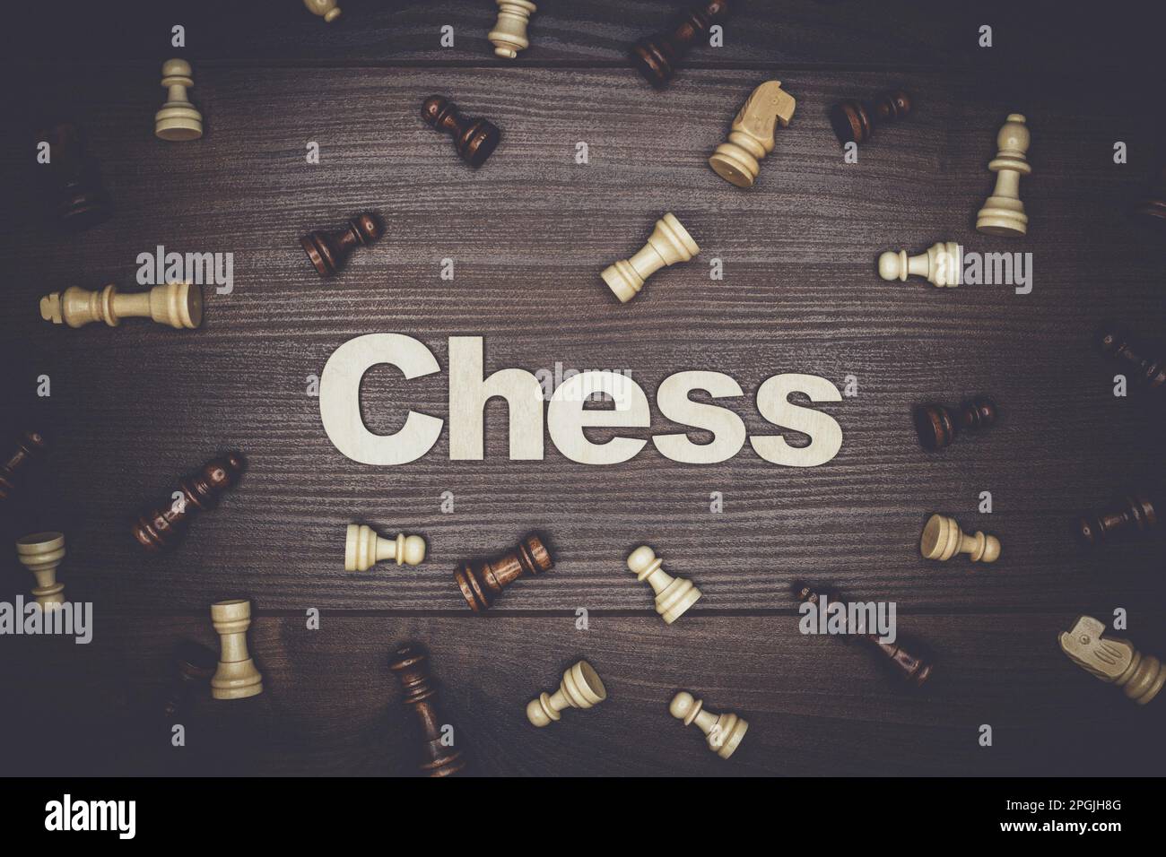 word chess on the brown wooden background Stock Photo - Alamy