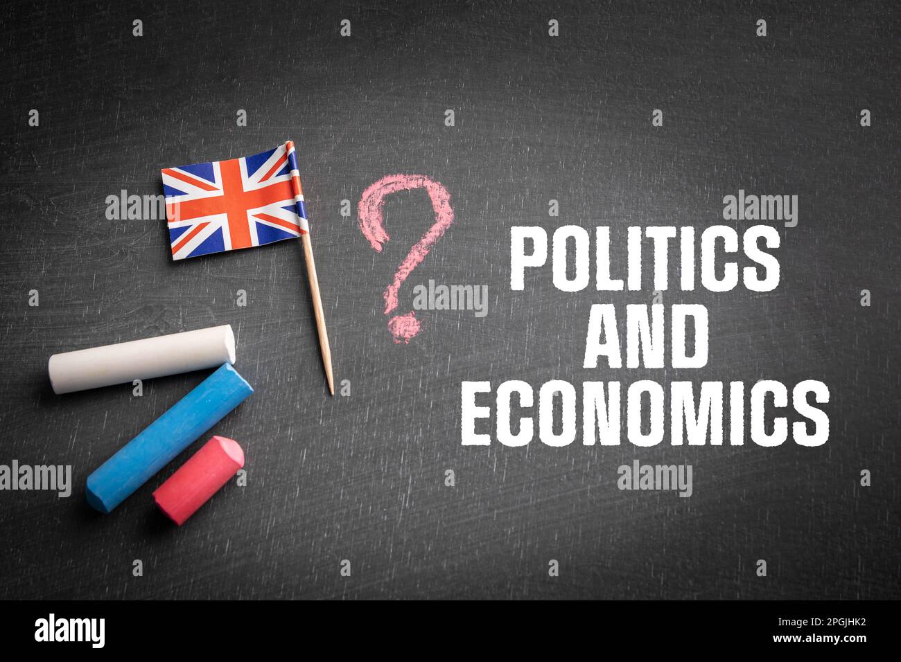 Politics and Economics. British flag and question mark on a dark ...