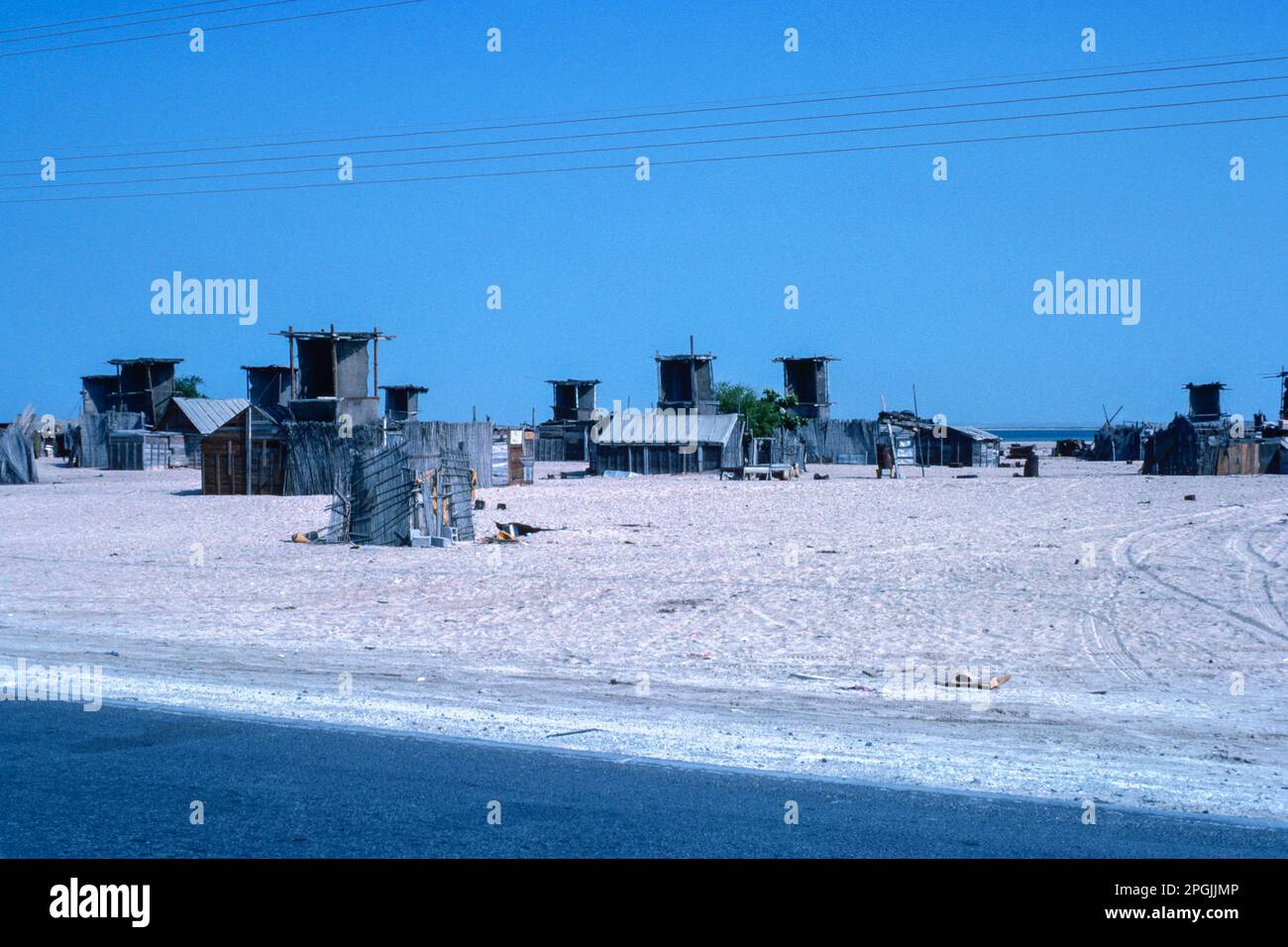 Umm Al Quwain UAE 1976 – barasti houses with wind-towers in the coastal ...