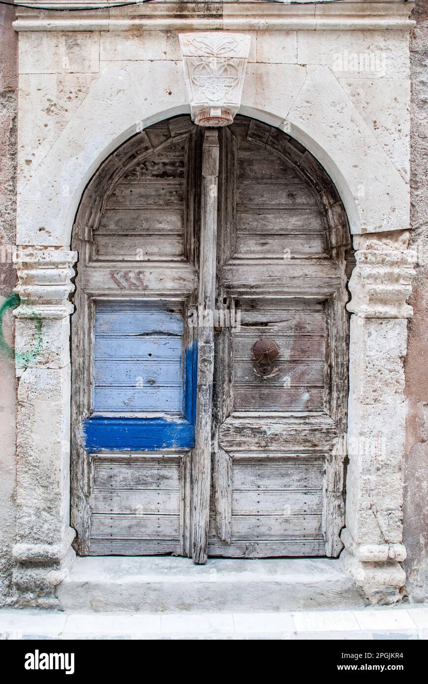 Old weathered doors,& stone arches to be seen in Crete when wandering ...