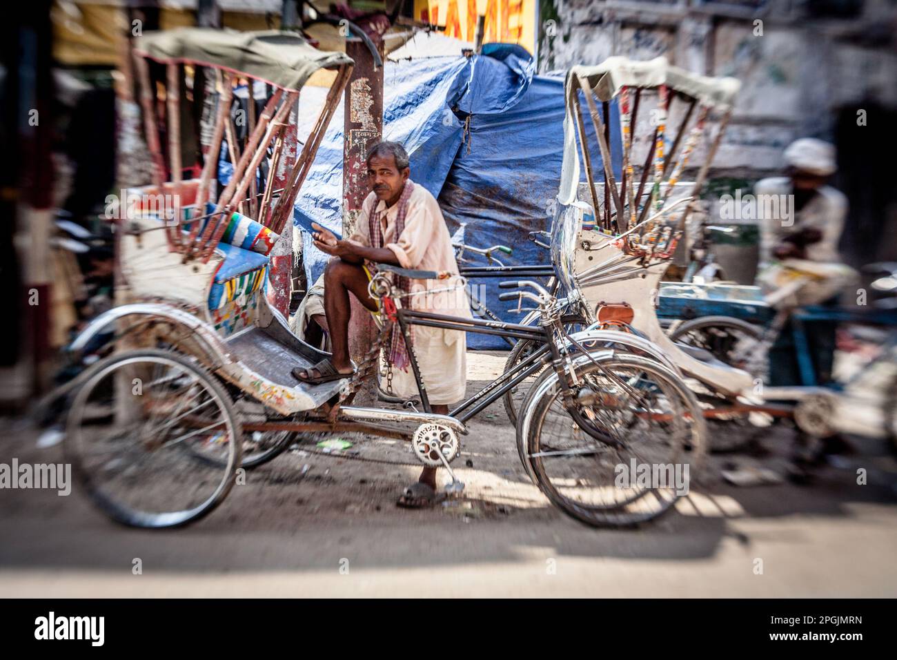 VARANASI, INDIA - OCTOBER 28: Morning on a street in Varanasi, India ...