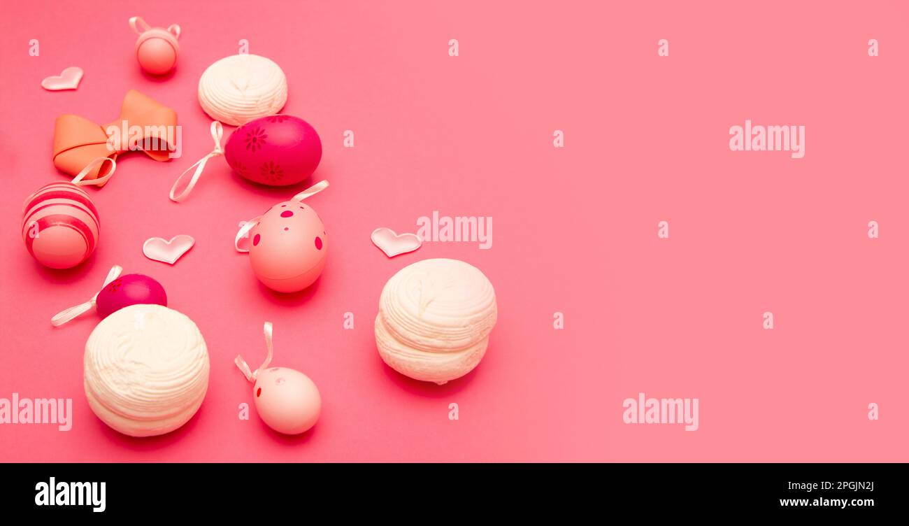 Pink Easter-themed backdrop with Easter eggs, big marshmallows, hearts ...