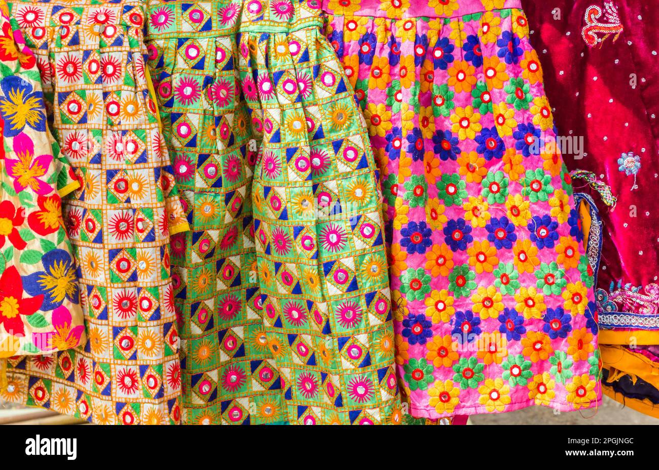 Colorful traditional indian fabric at a street market in Jaipur, India ...