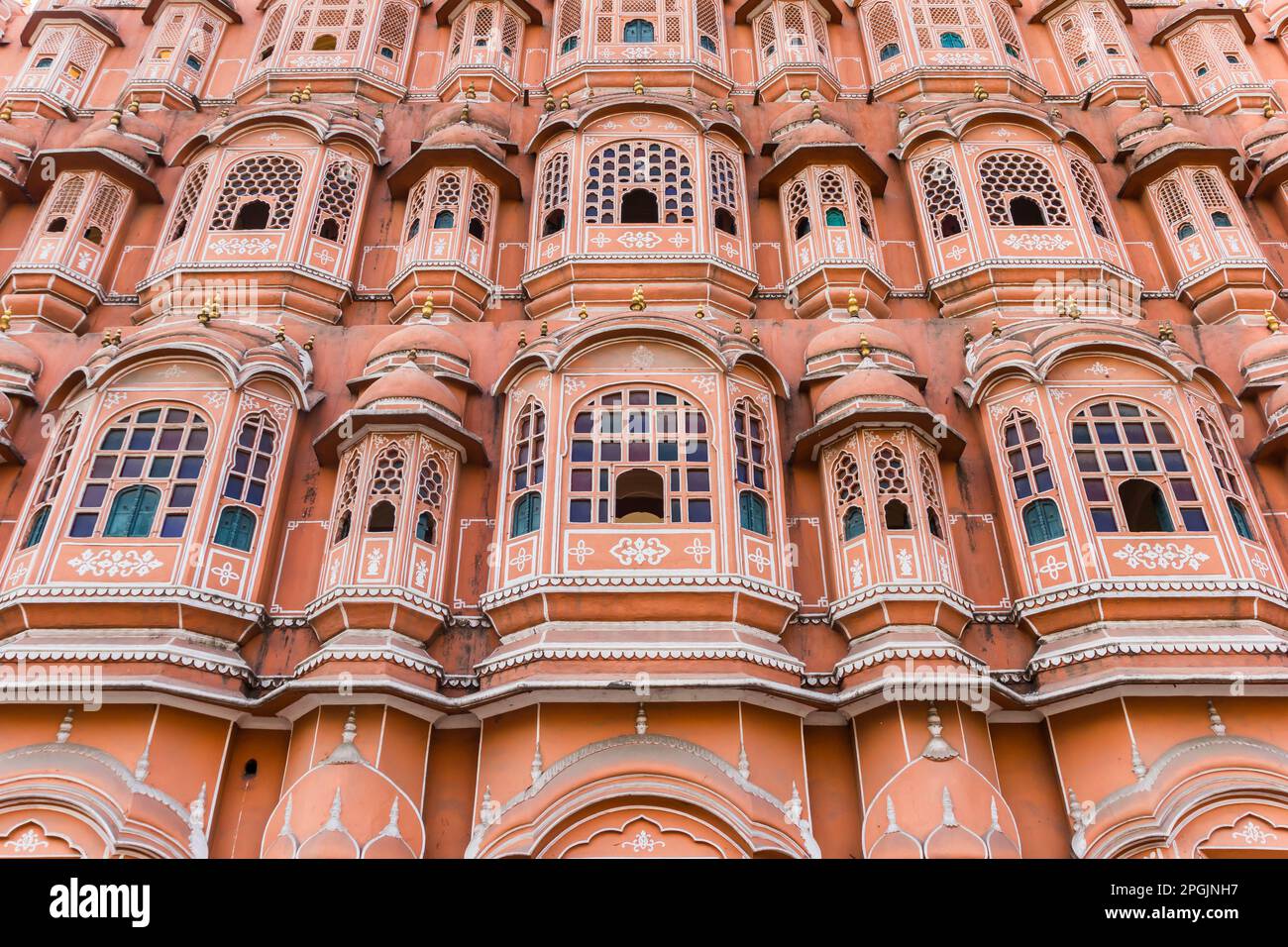 Colorful windows of the Palace of the Winds in Jaipur, India Stock ...