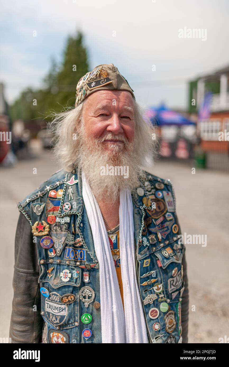 Motorcycle enthusiast with heavily badged vest Stock Photo - Alamy