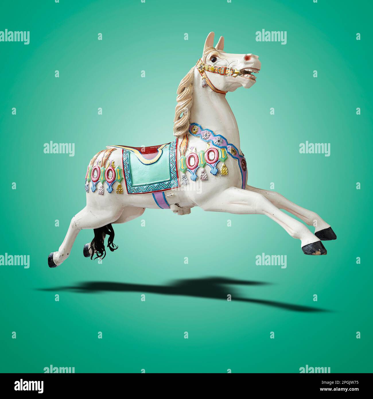 Floating classic carousel horse on green gradient background Stock ...