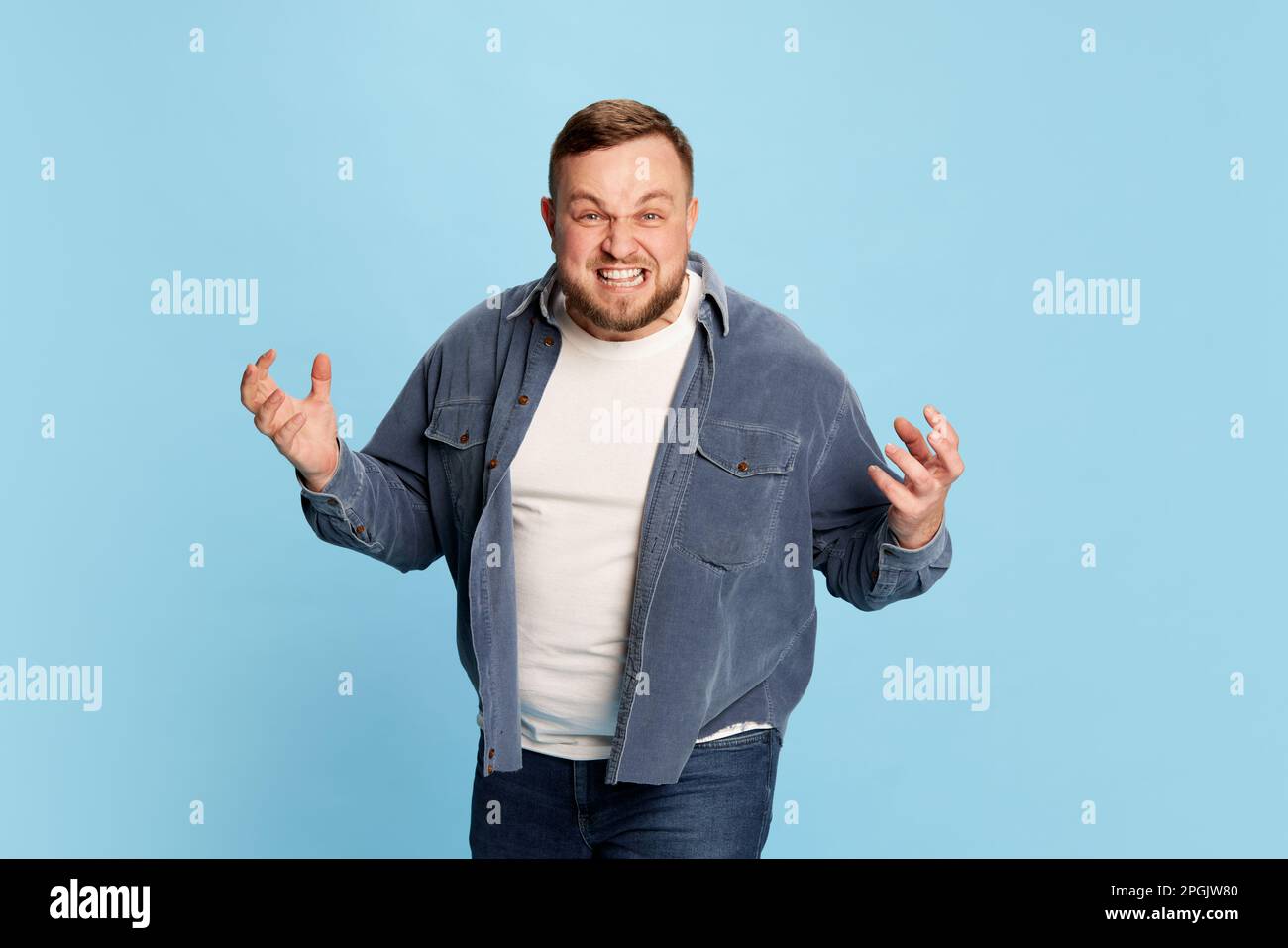 Portrait of angry bearded man with furious facial expression, screaming ...