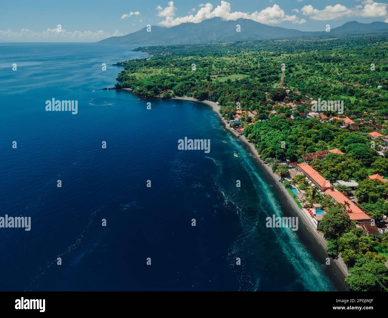 Aerial view of scenic coastline with transparent ocean on Northern Bali ...