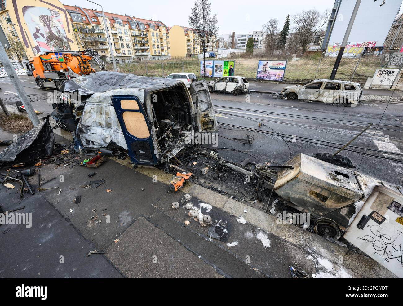 Dresden, Germany. 23rd Mar, 2023. Burnt-out cars stand on the side of ...