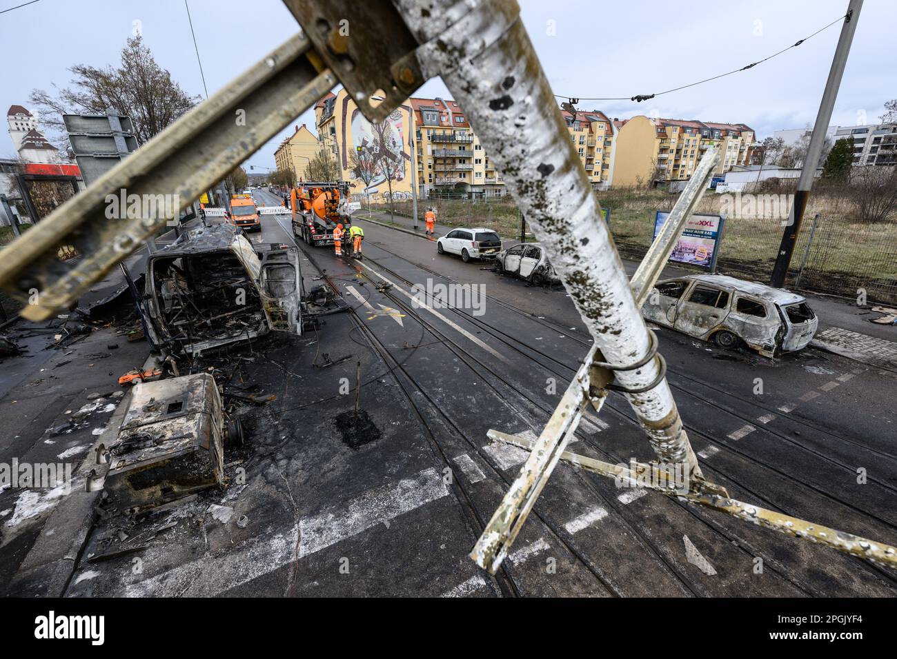 Dresden, Germany. 23rd Mar, 2023. Burnt-out cars stand on the side of ...