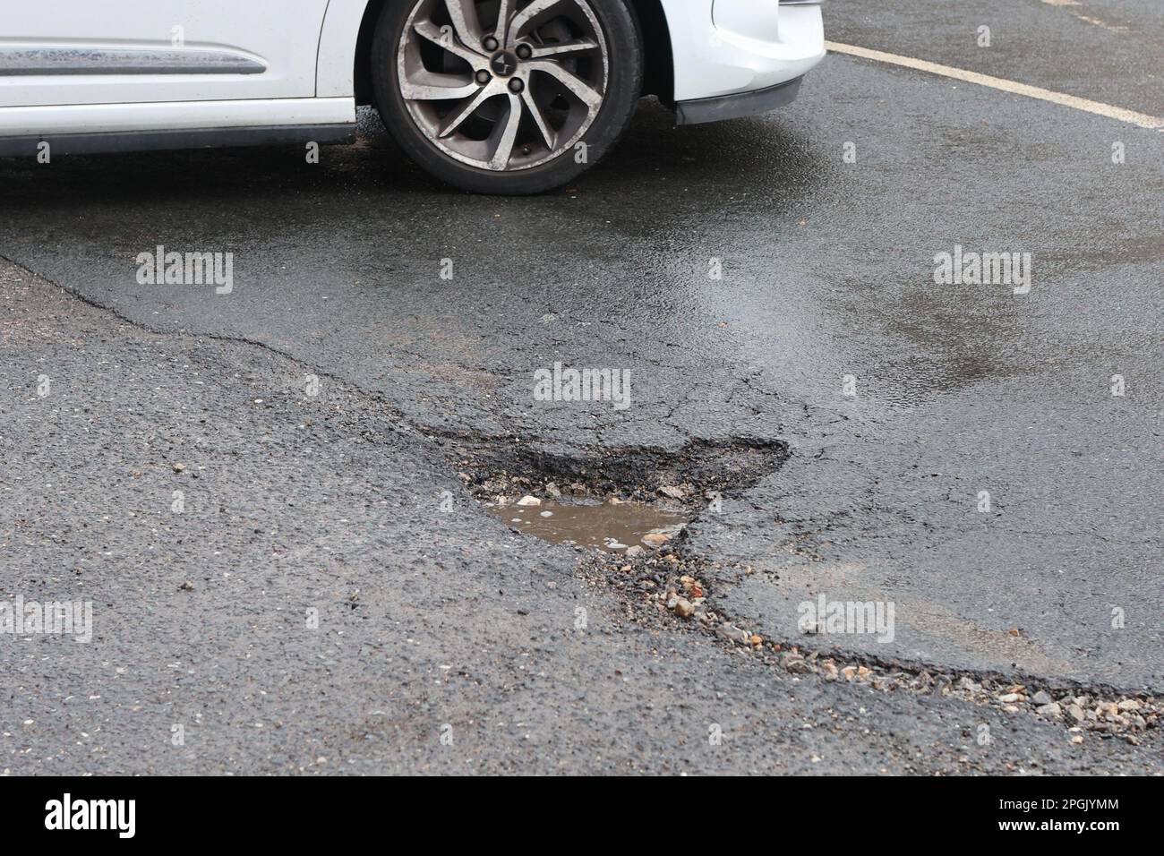 Potholes uk broken car hi-res stock photography and images - Alamy