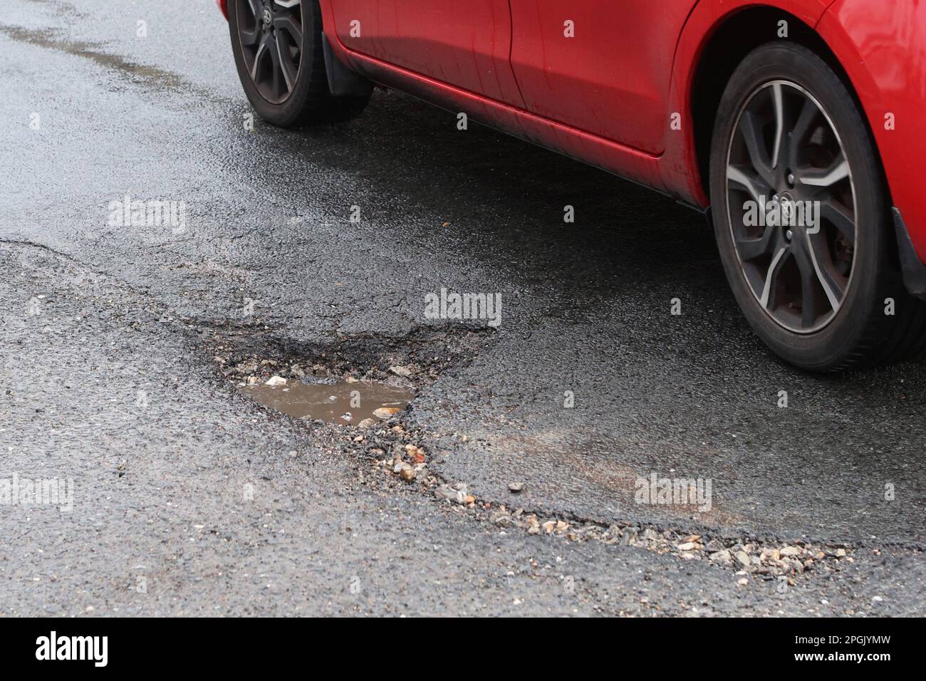 Potholes uk broken car hi-res stock photography and images - Alamy