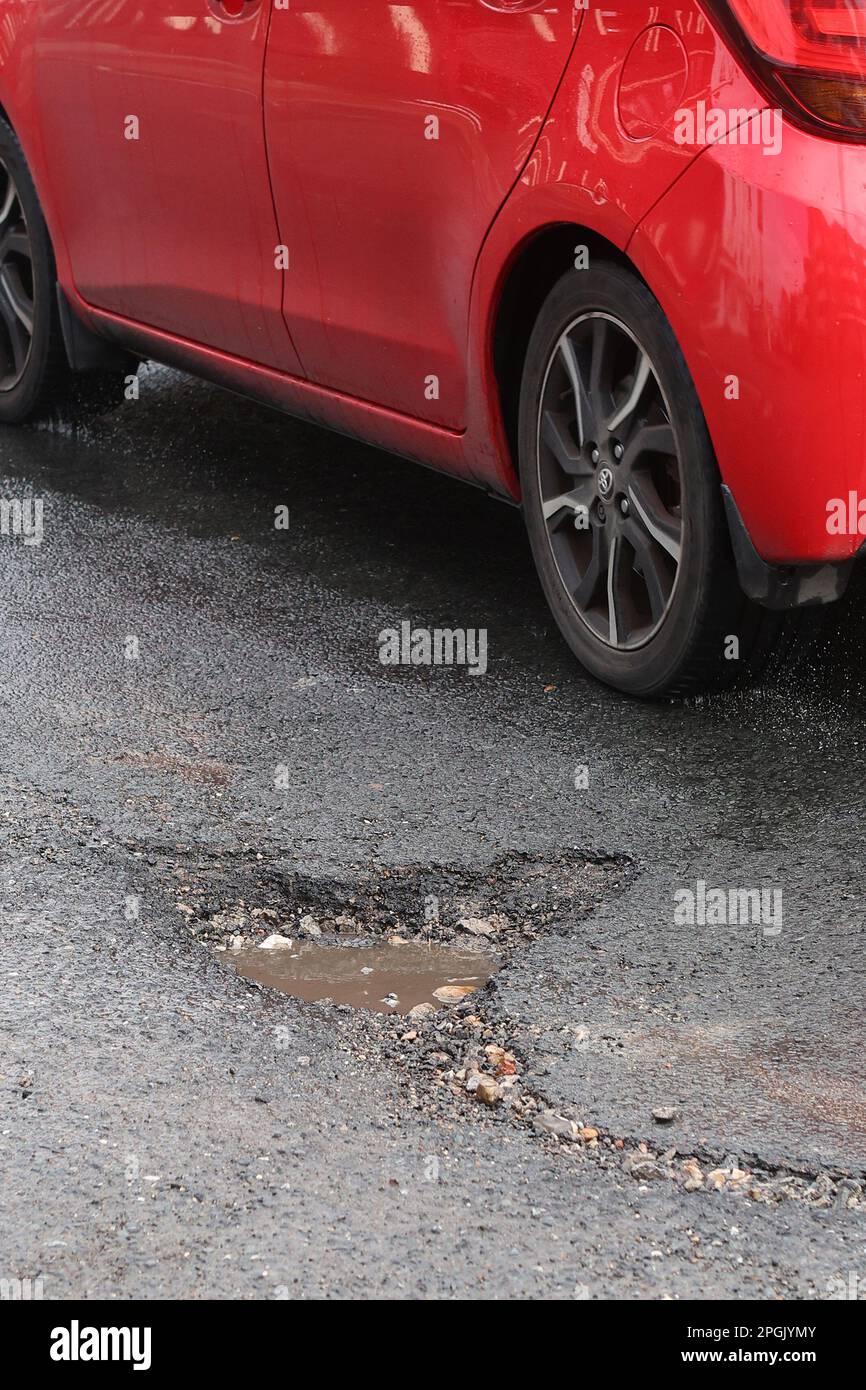 Potholes uk broken car hi-res stock photography and images - Alamy