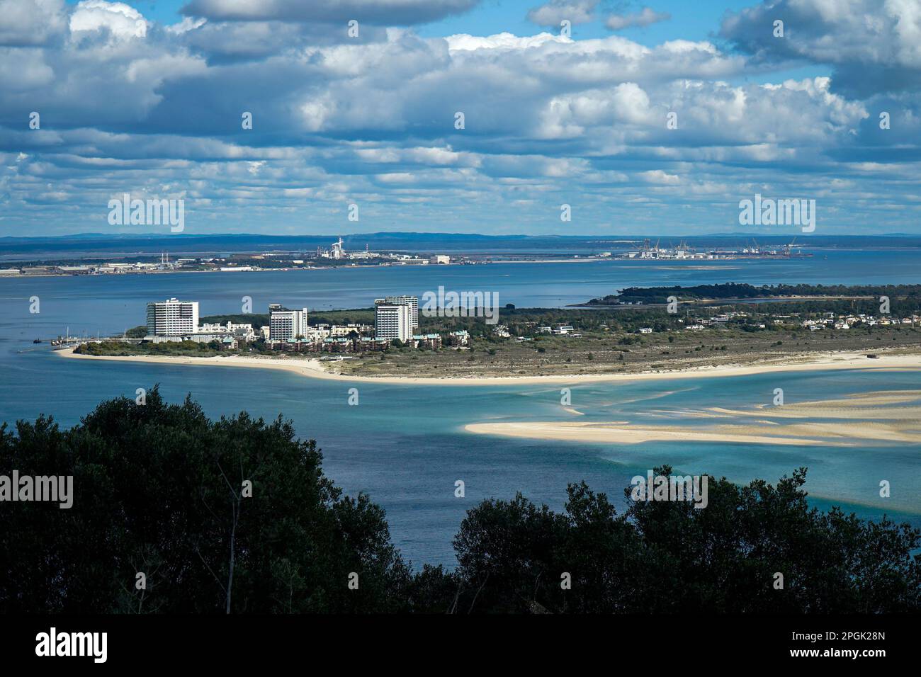 View of the Tróia peninsula, with the industrial zone of Setubal in the ...