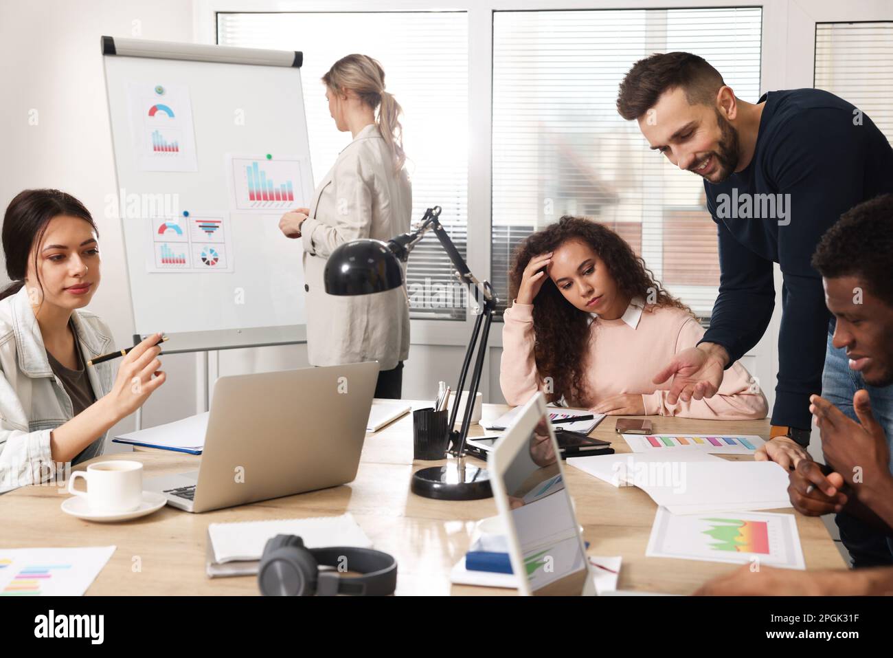 Team of employees working together in office. Startup project Stock ...