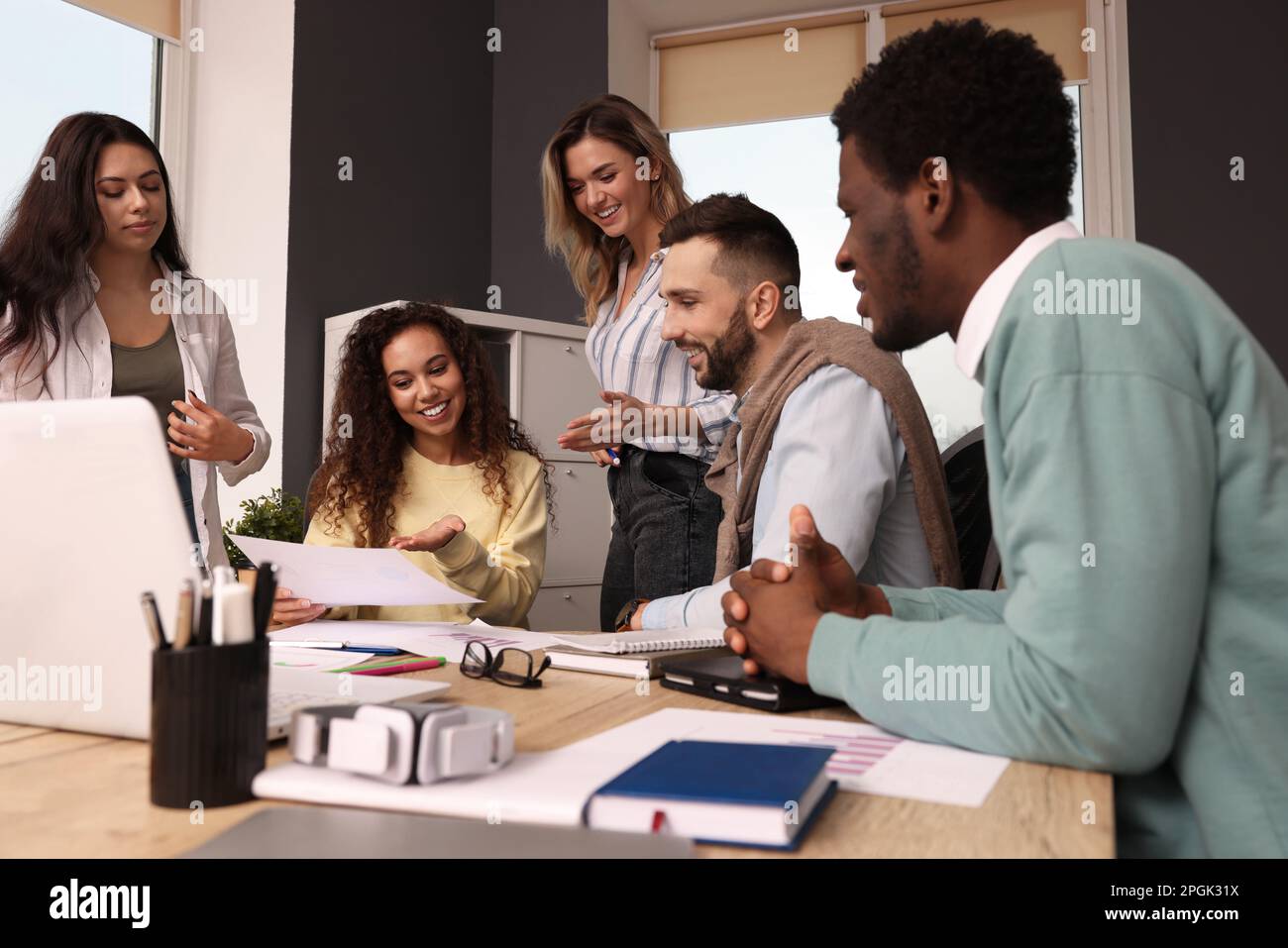 Team of employees working together in office. Startup project Stock ...