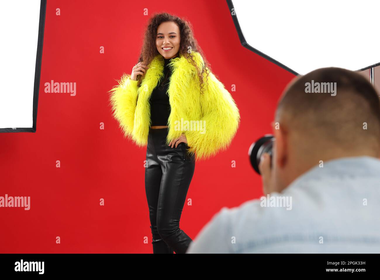 Beautiful African American model posing for professional photographer ...