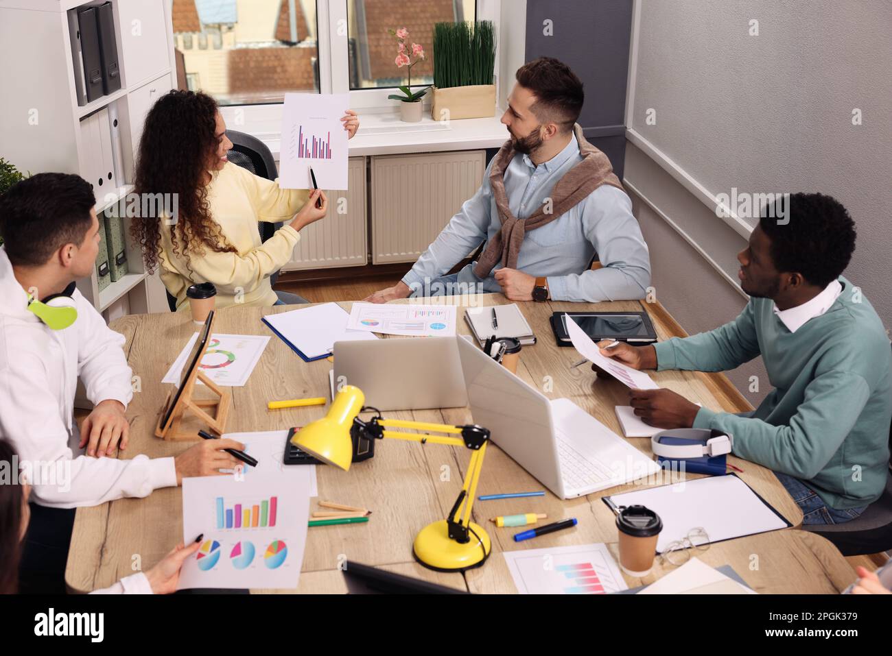 Team of employees working together in office. Startup project Stock ...