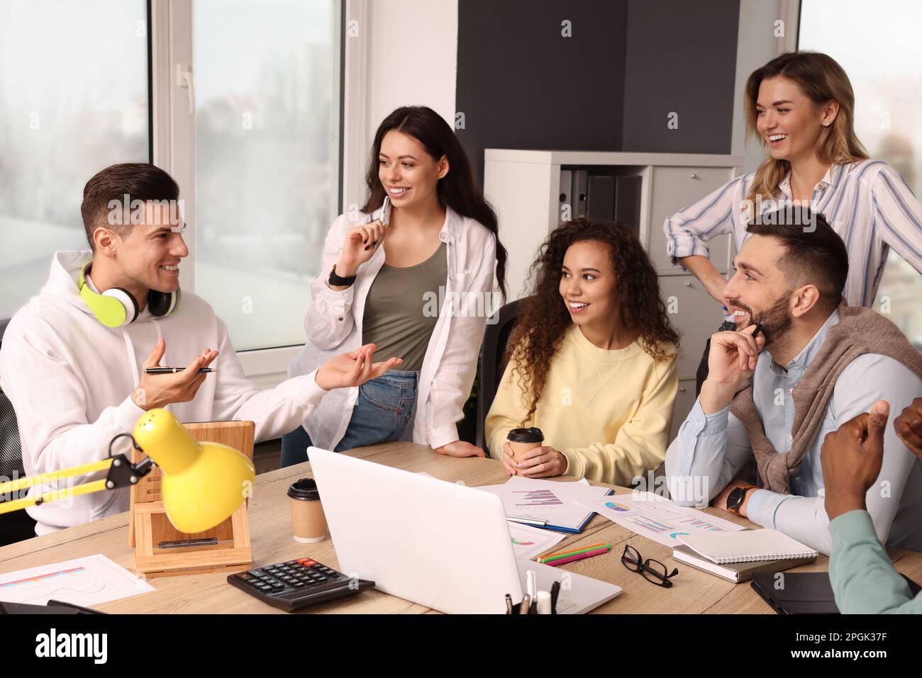 Team of employees working together in office. Startup project Stock ...