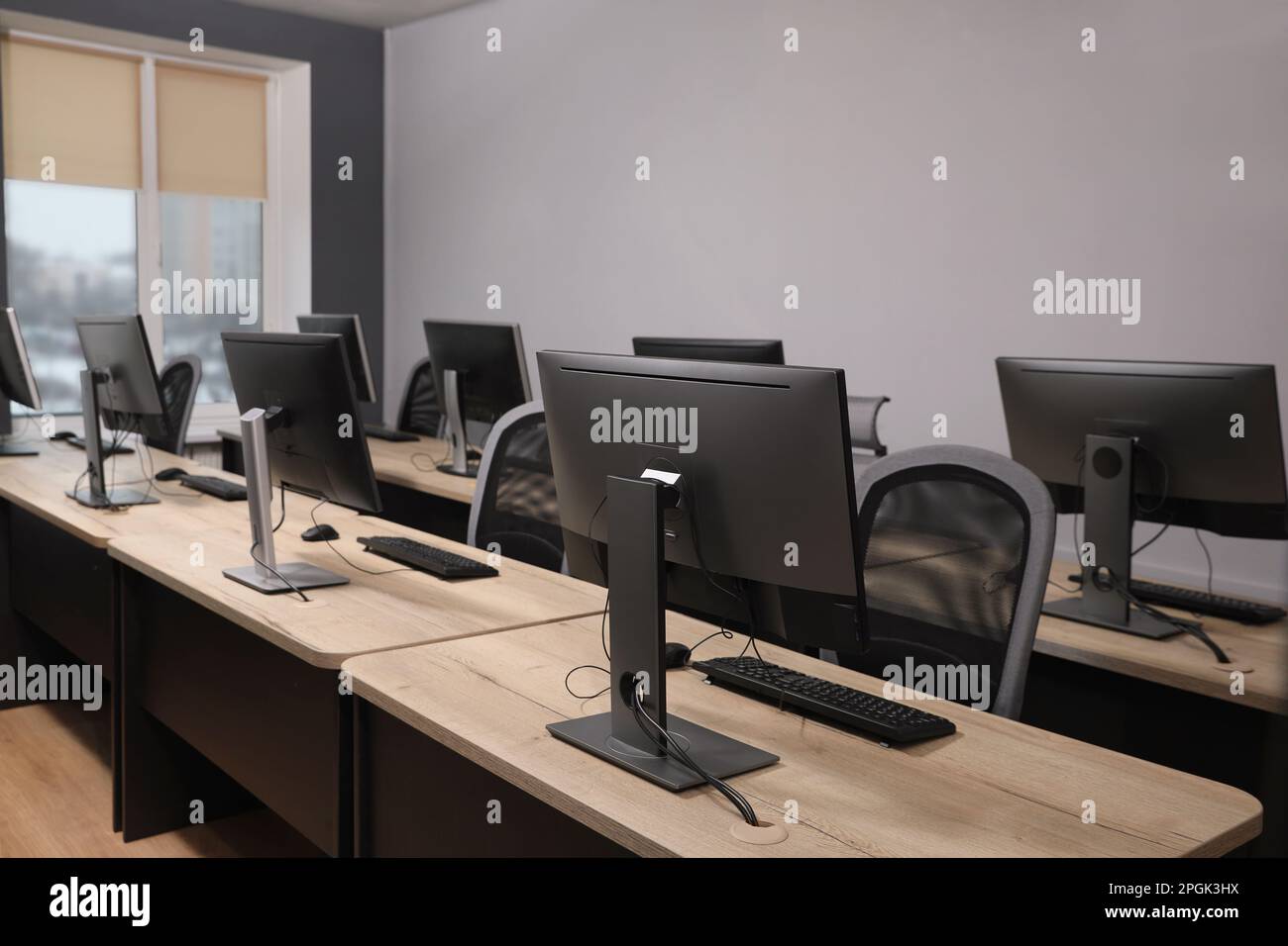 Rows of computers in empty office hi-res stock photography and images ...