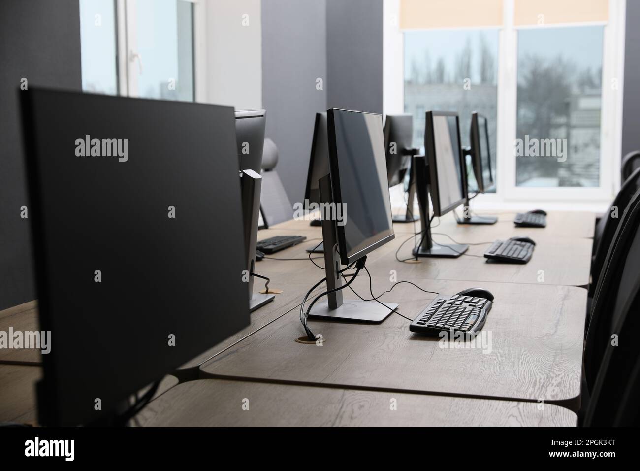 Rows of computers in empty office hi-res stock photography and images ...