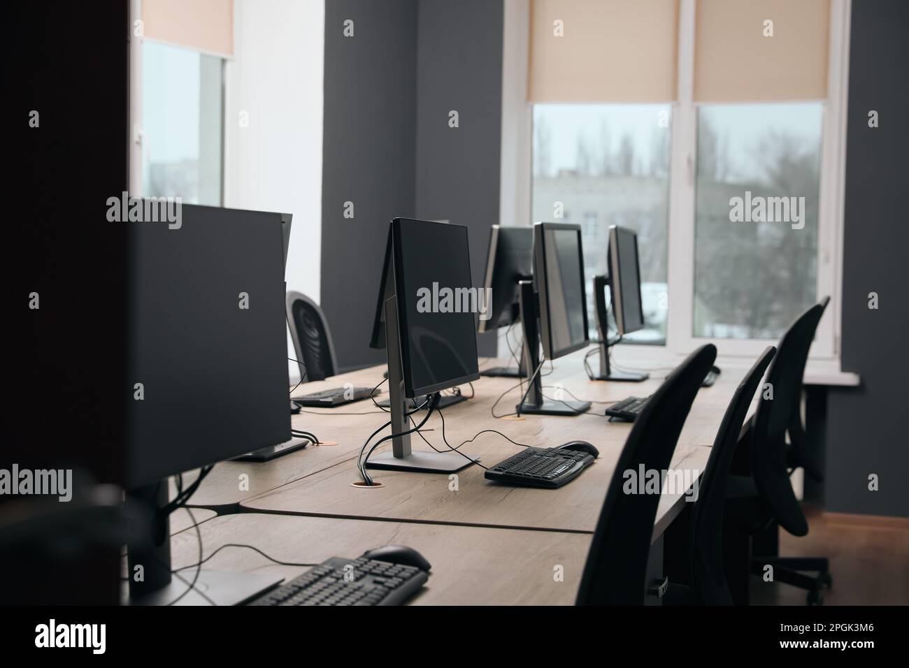 Many modern computers in open space office Stock Photo - Alamy