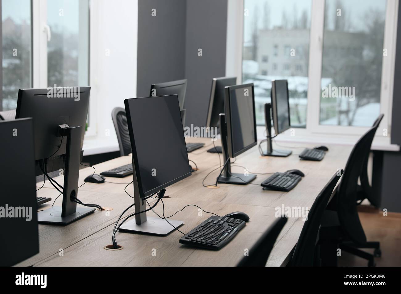 Rows of computers in empty office hi-res stock photography and images ...