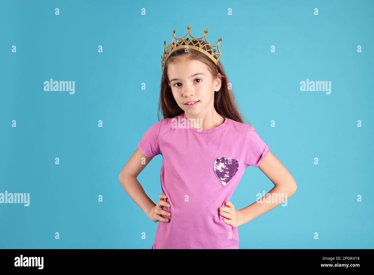 Cute girl in golden crown with gems on light blue background. Little ...