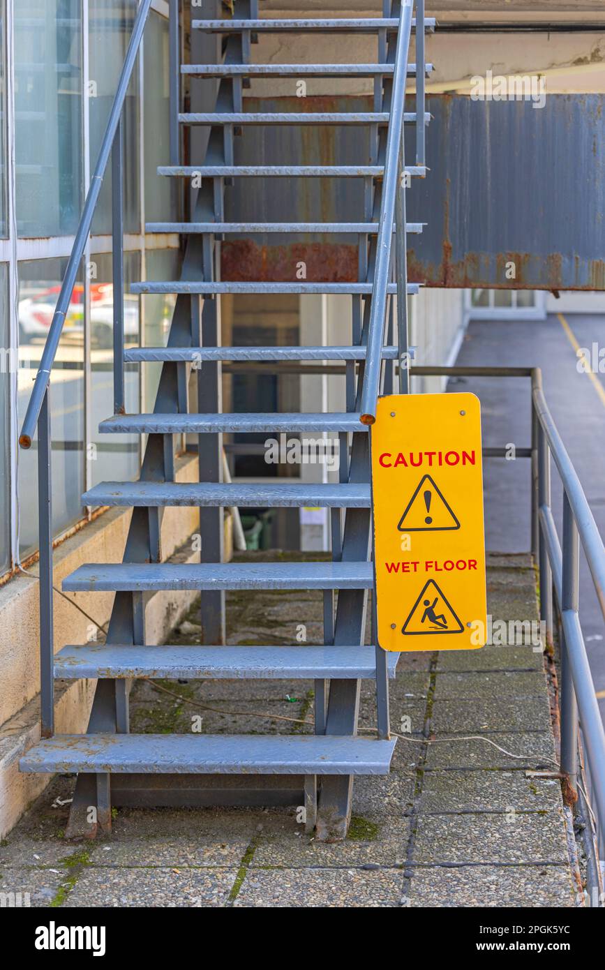 Caution Wet Floor Sign Exclamation Triangle Safety Warning at Metal ...