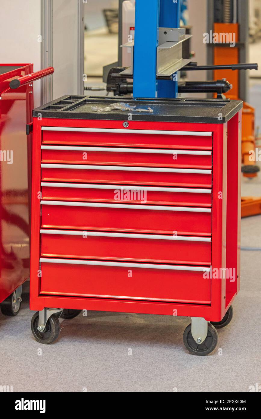 Rolling Red Tool Cart Drawers in Garage Workshop Stock Photo - Alamy