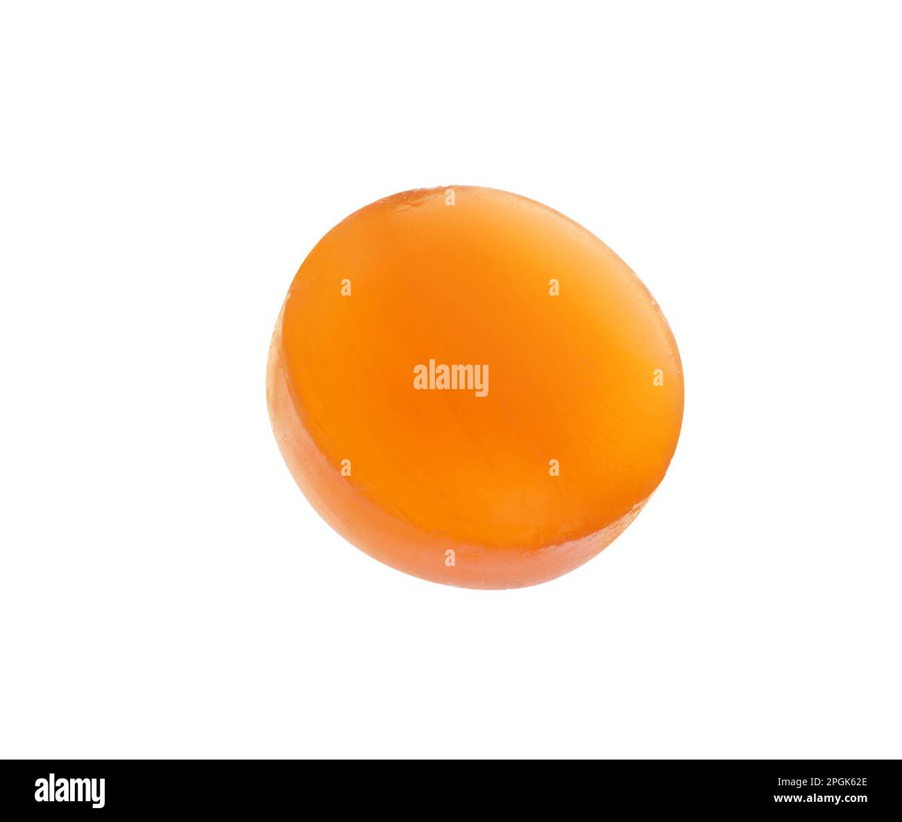 One orange cough drop isolated on white Stock Photo - Alamy