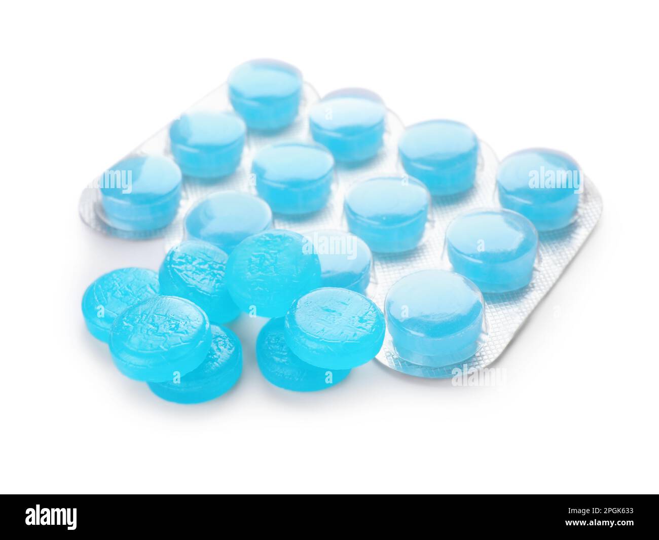 Many light blue cough drops on white background Stock Photo - Alamy
