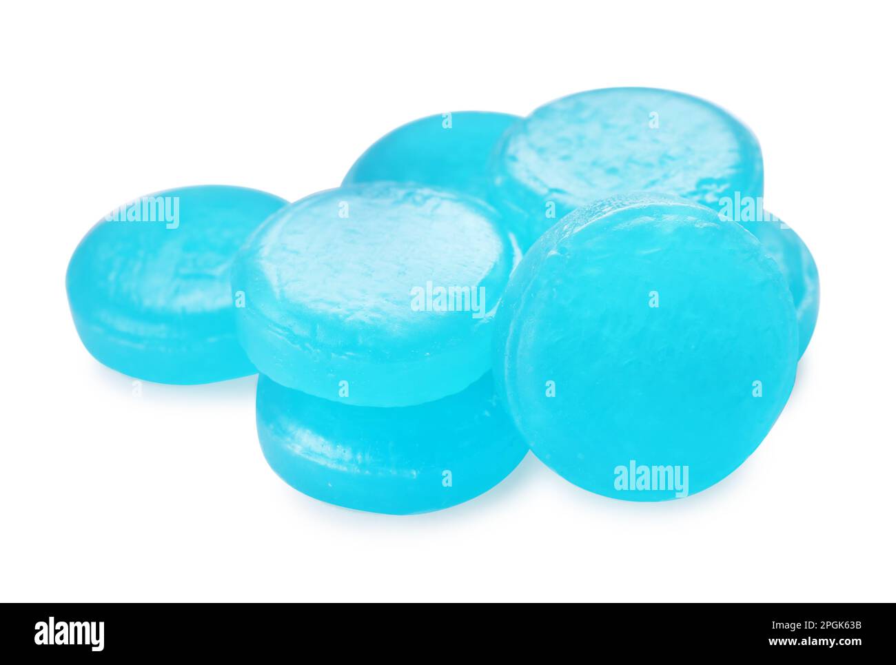Many light blue cough drops on white background Stock Photo - Alamy