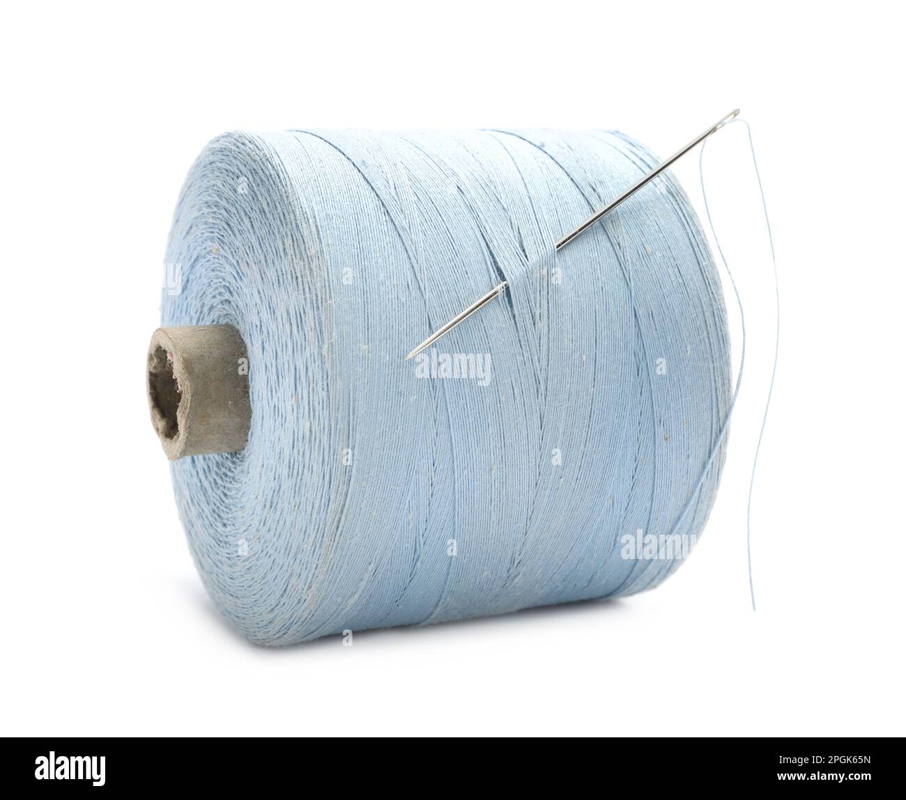 Light blue sewing thread with needle on white background Stock Photo ...