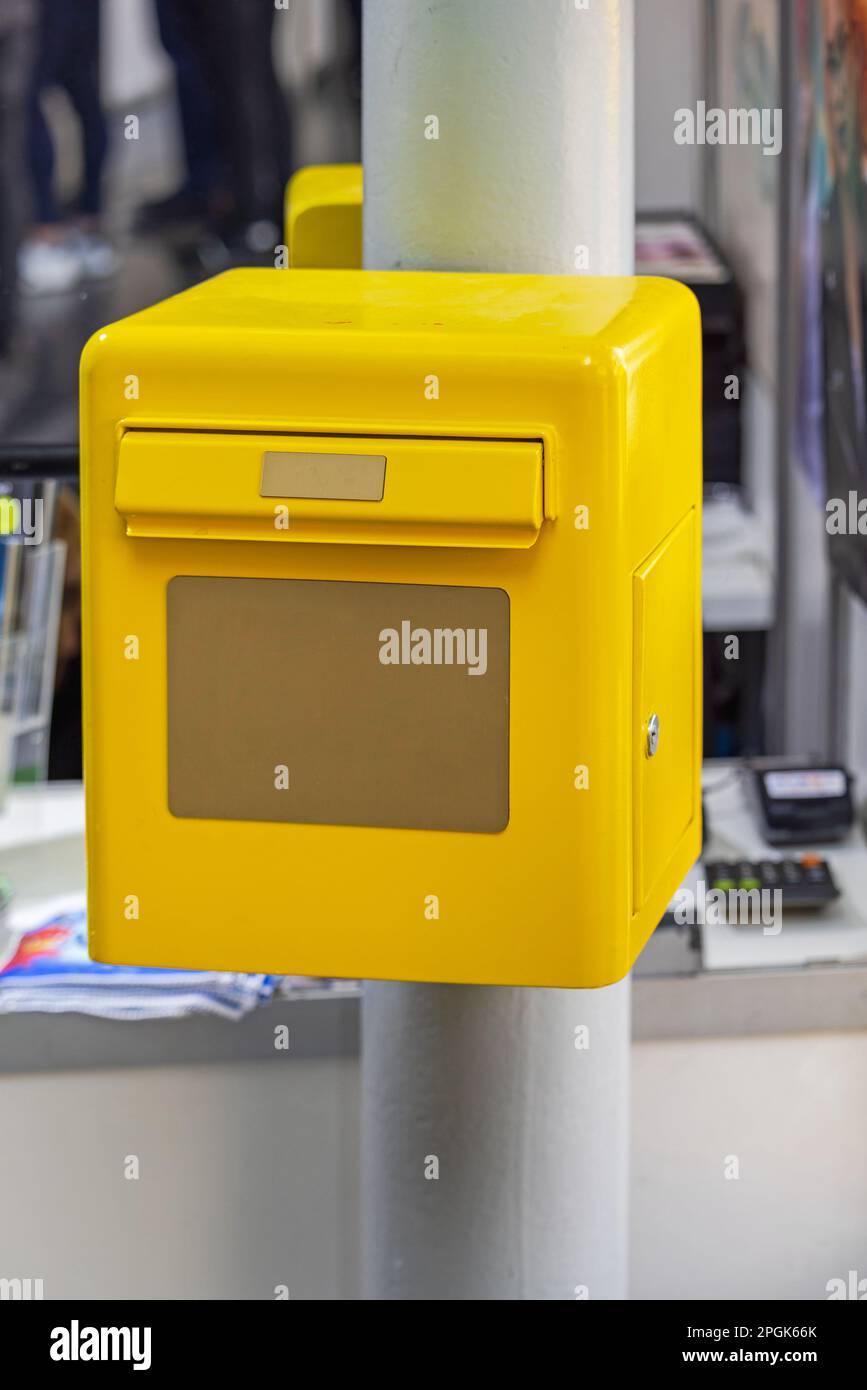 Yellow Mail Box at Pole Letters Postal Service Stock Photo - Alamy