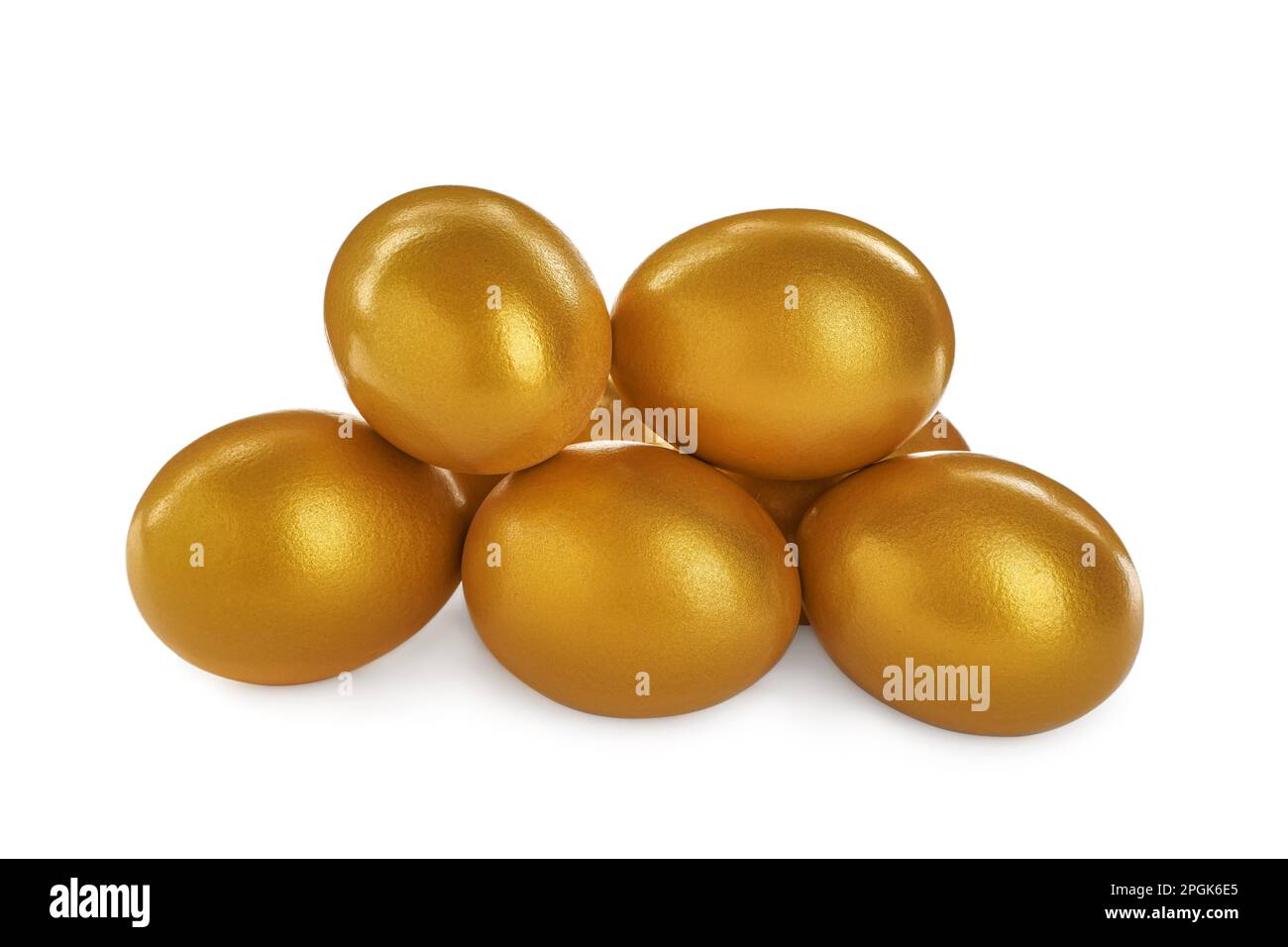Many shiny golden eggs on white background Stock Photo - Alamy