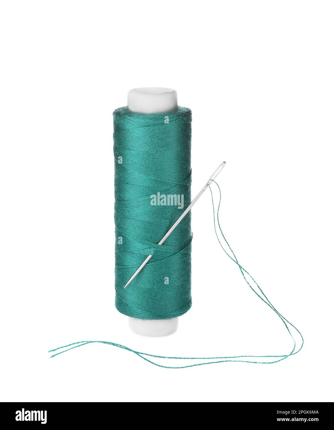 Bright sewing thread with needle isolated on white Stock Photo - Alamy