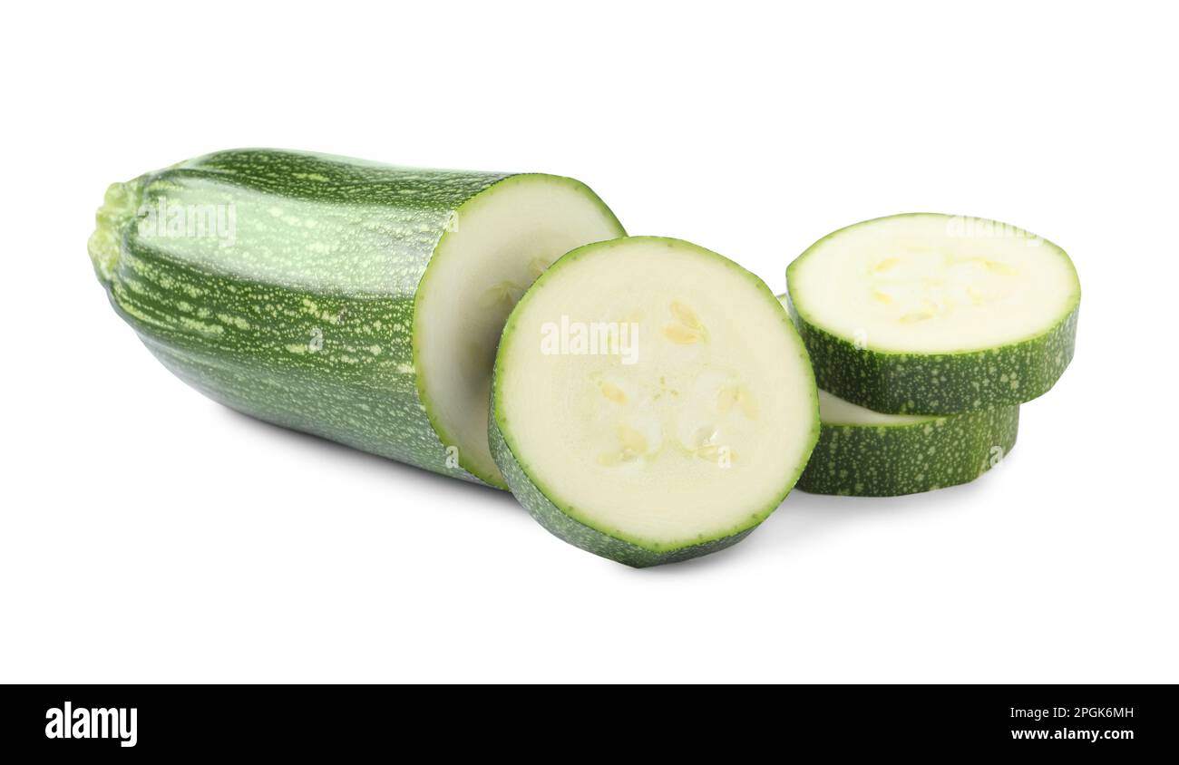 Cut green ripe zucchini isolated on white Stock Photo - Alamy