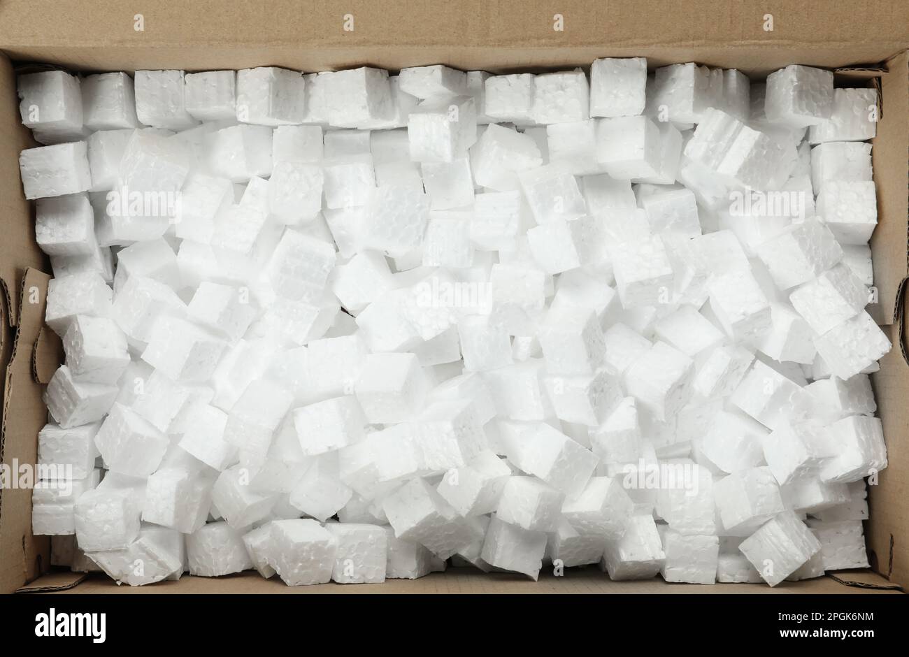 Closeup view of cardboard box with styrofoam cubes Stock Photo - Alamy